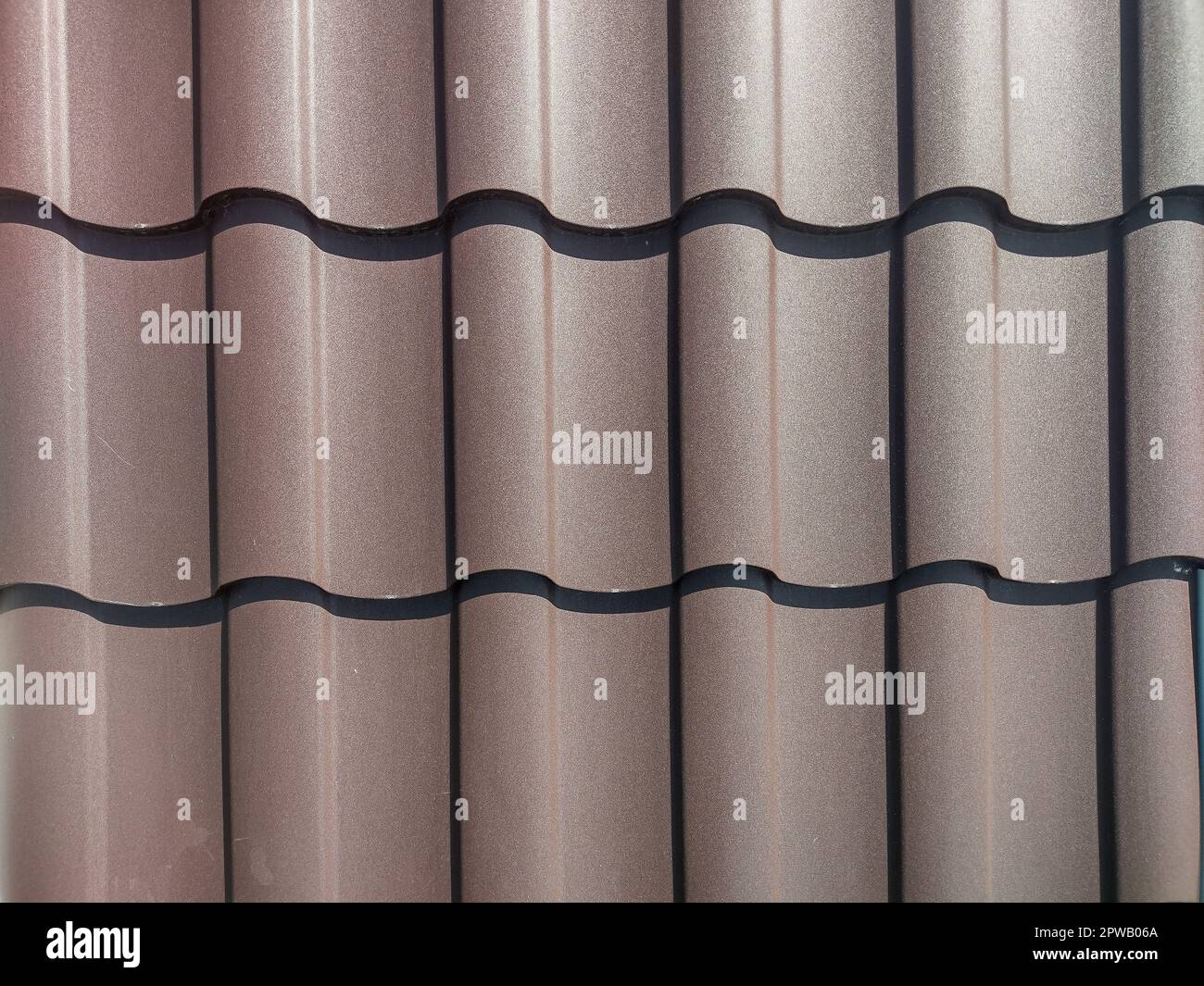 Metal tile for the roof of buildings Stock Photo - Alamy
