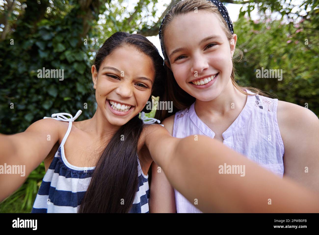Fun times with my bestie. two young girl friends taking a selfie ...