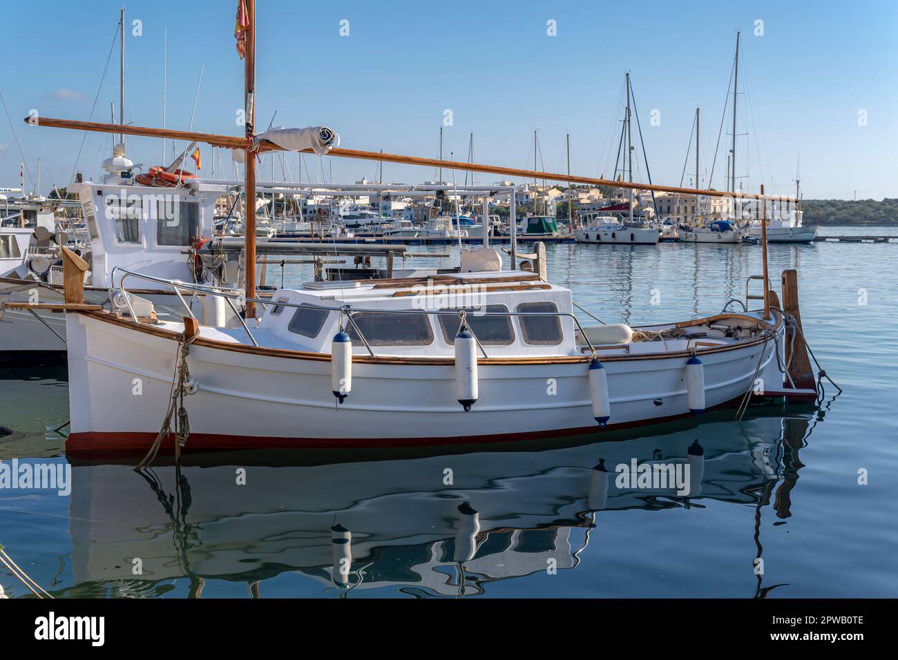 Traditional fishing boat, llaut, moored at the dock of the Majorcan ...