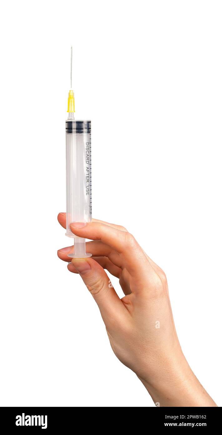 Hand holding syringe isolated on white Stock Photo - Alamy