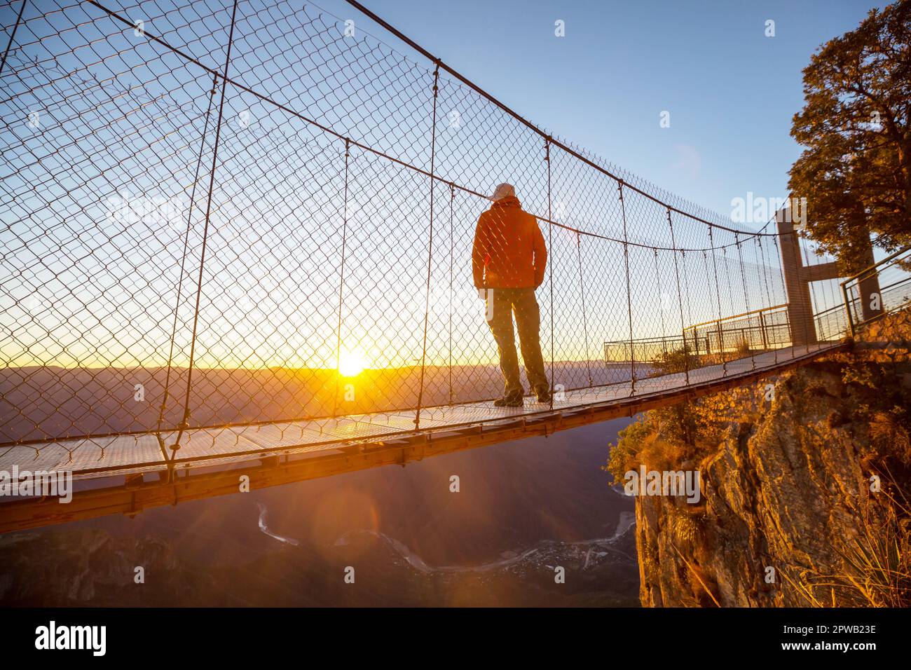 Man on the suspension bridge in Barrancas mountains, Mexico Stock Photo ...