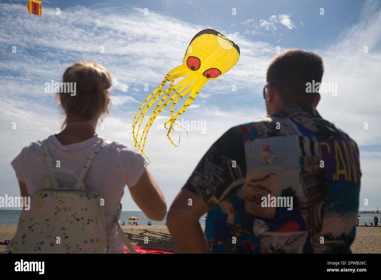 Malaga, Spain. 29th Apr, 2023. People are seen watching a kite ...