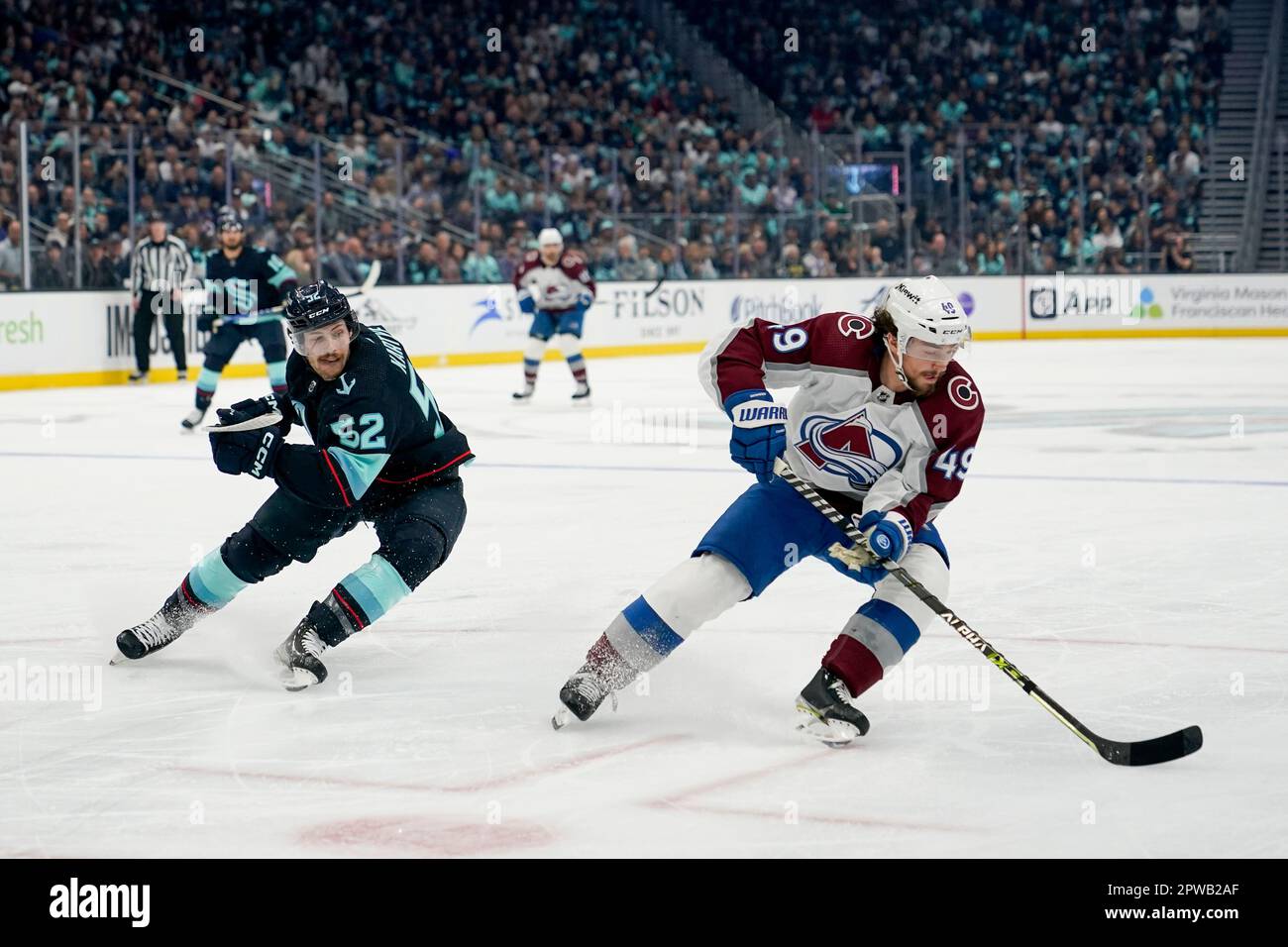 Colorado Avalanche defenseman Samuel Girard (49) moves the puck against ...