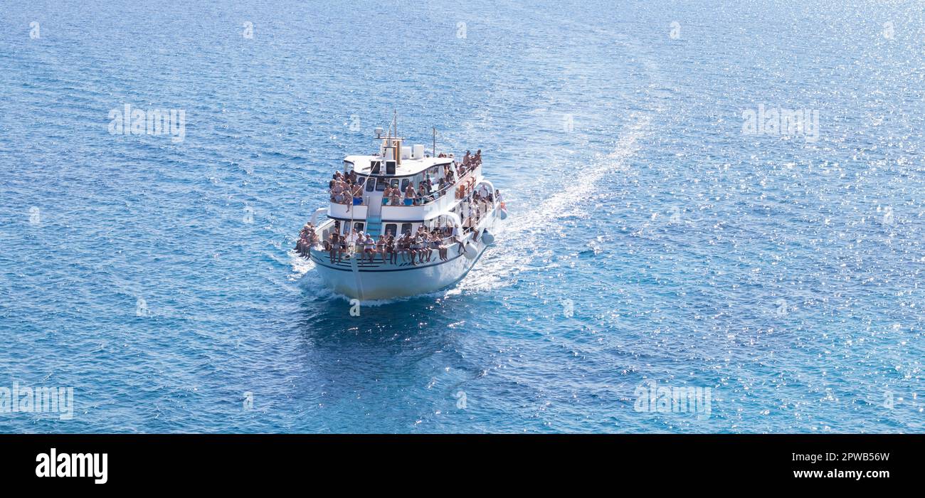 Portugal, Vilamoura, 02.01.2023. ferry with tourists in the ocean ...