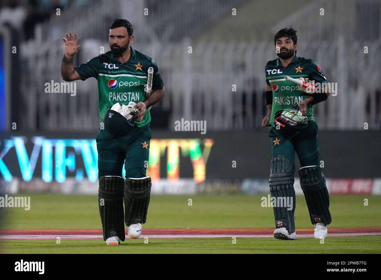 Pakistan's Fakhar Zaman, left, and Mohammad Rizwan, right, acknowledge ...