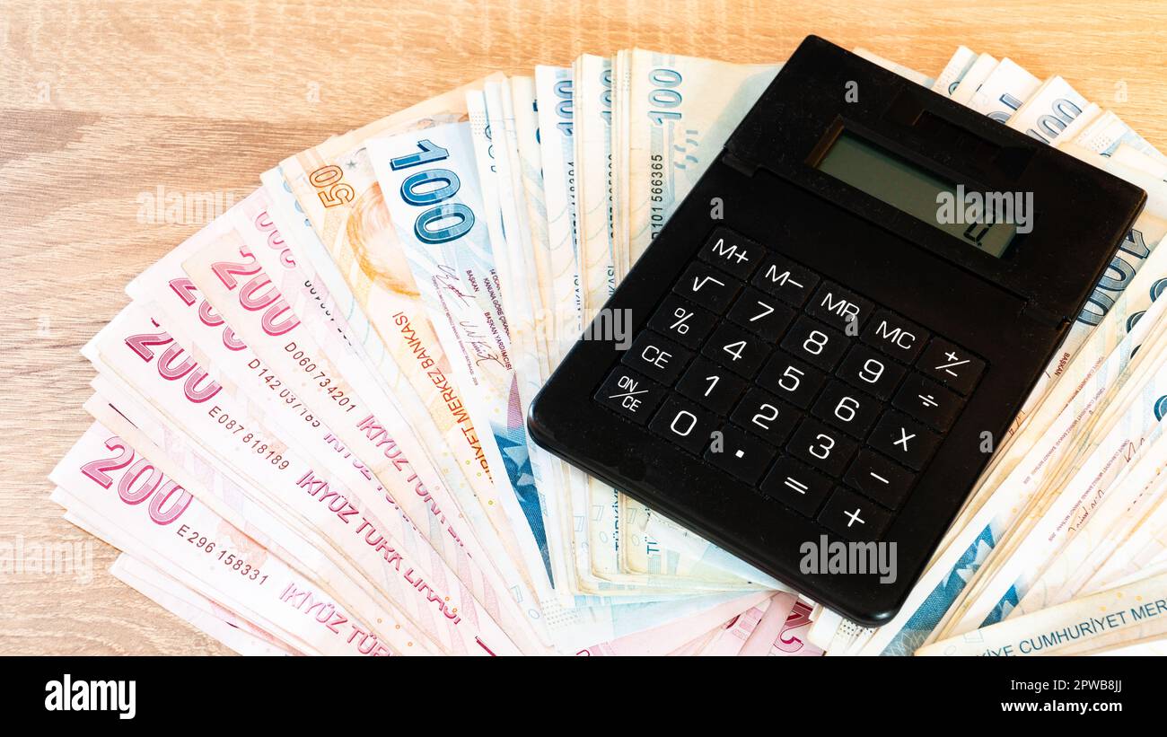 Turkish lira banknotes and calculator. Accounting concept Stock Photo ...