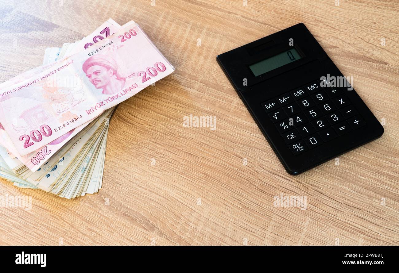 Turkish lira banknotes and calculator. Accounting concept Stock Photo ...