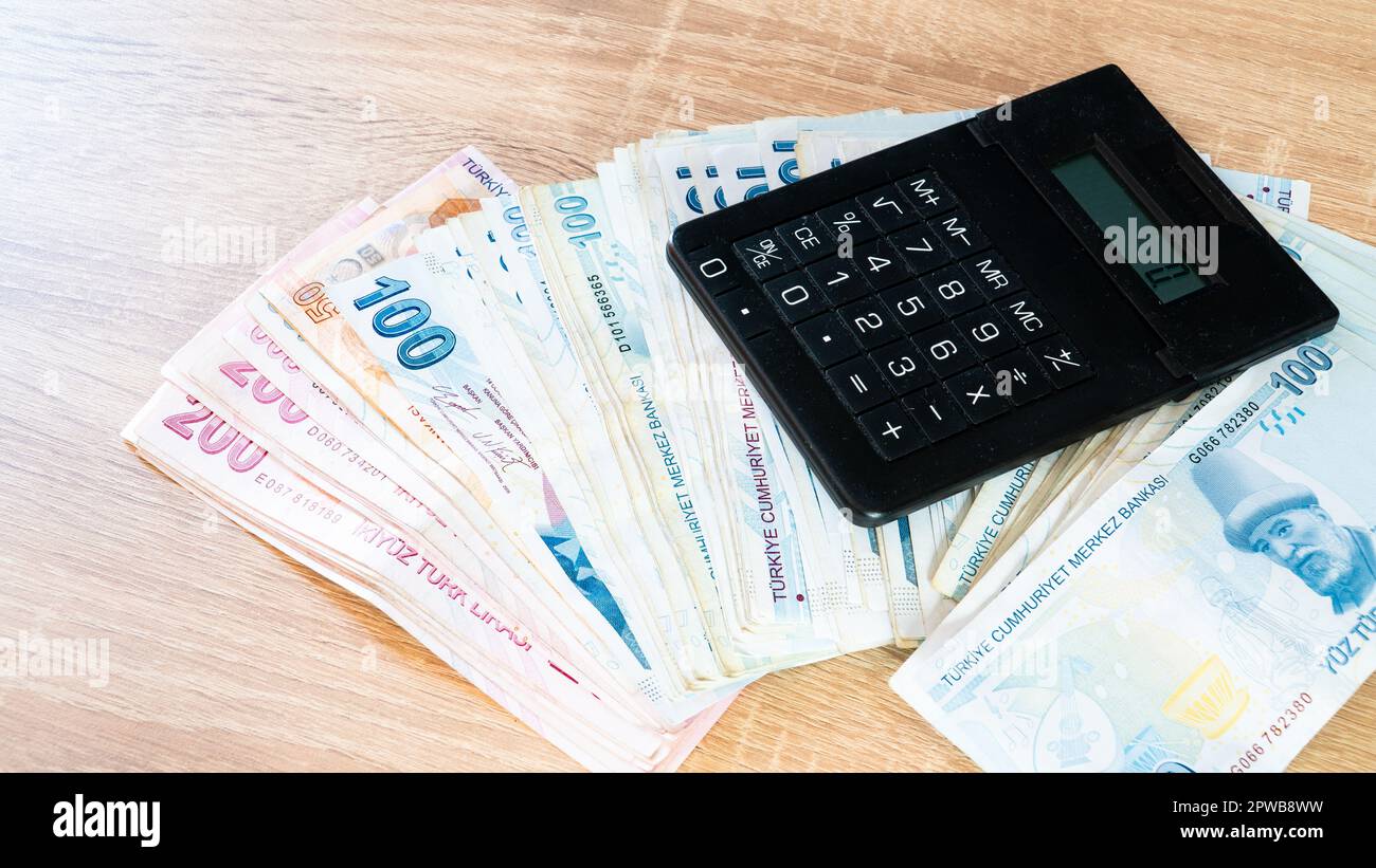 Turkish lira banknotes and calculator. Accounting concept Stock Photo ...