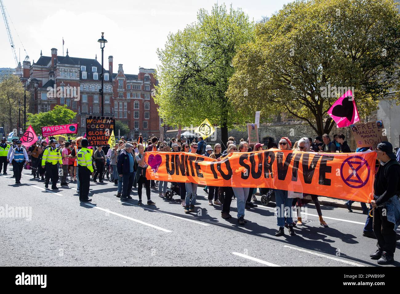 London, UK. 29th April, 2023. Just Stop Oil climate activists march ...