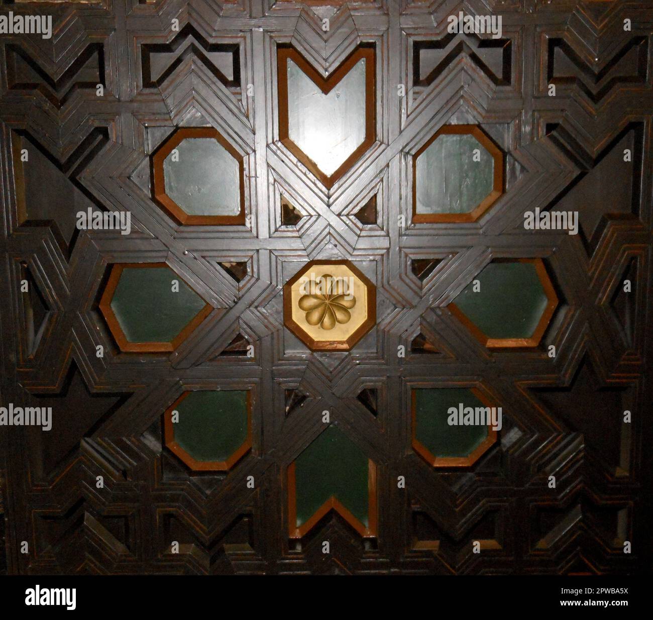 Dark wood colored coffered ceiling with gold trim in a hall Stock Photo ...