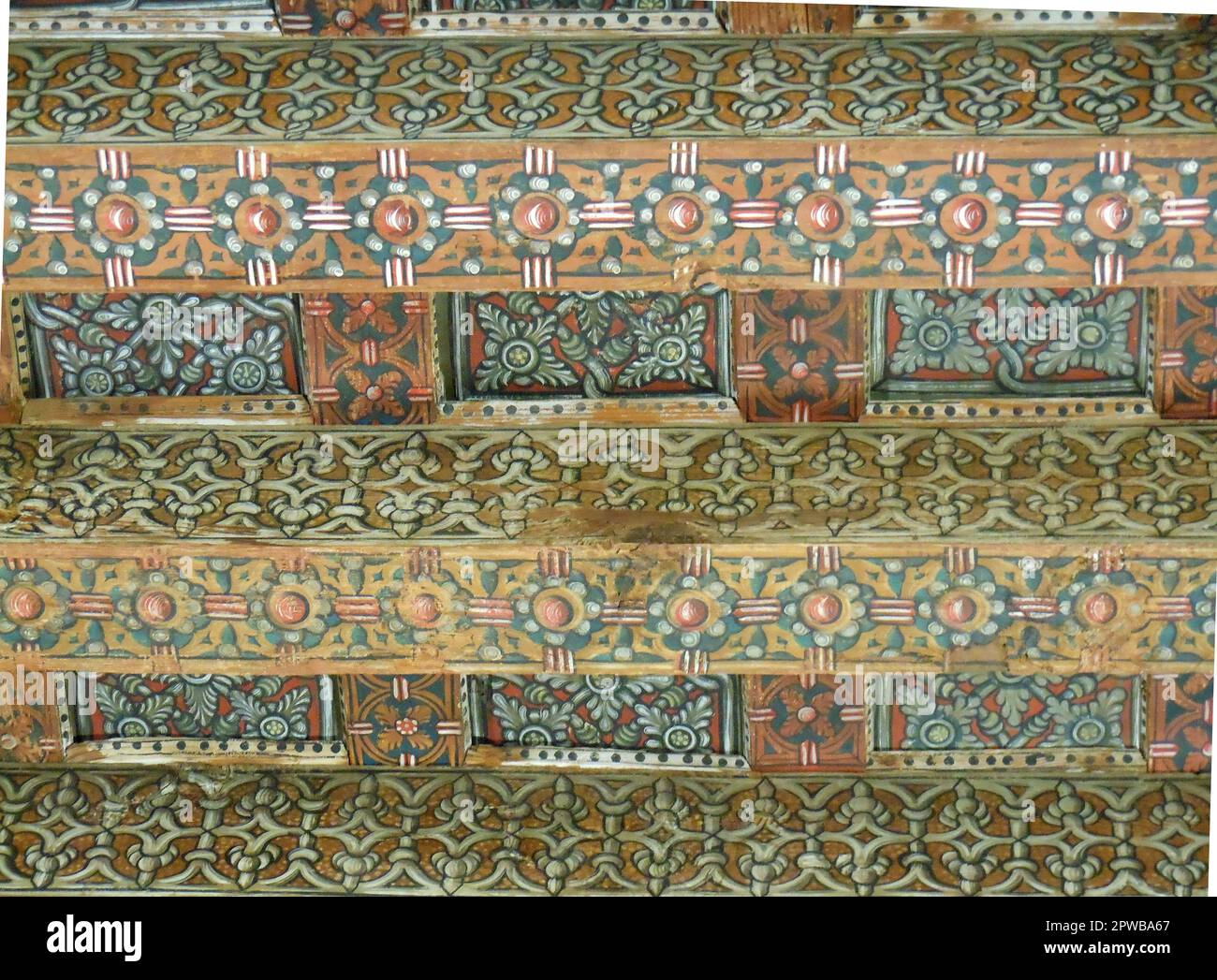 Ancient polychrome background with various geometric shapes adorning ...