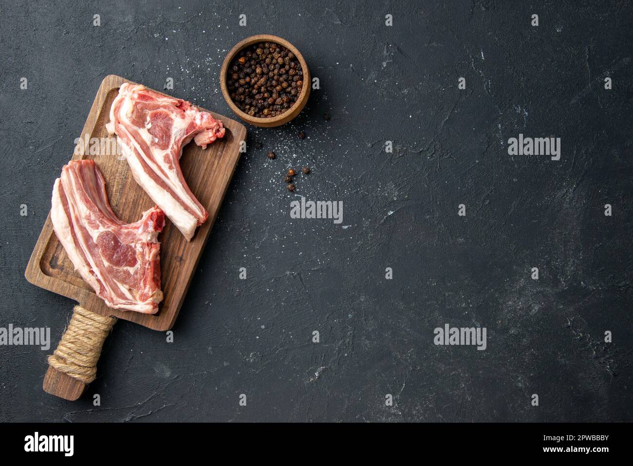 top view fresh meat ribs raw meat on dark background barbecue animal ...
