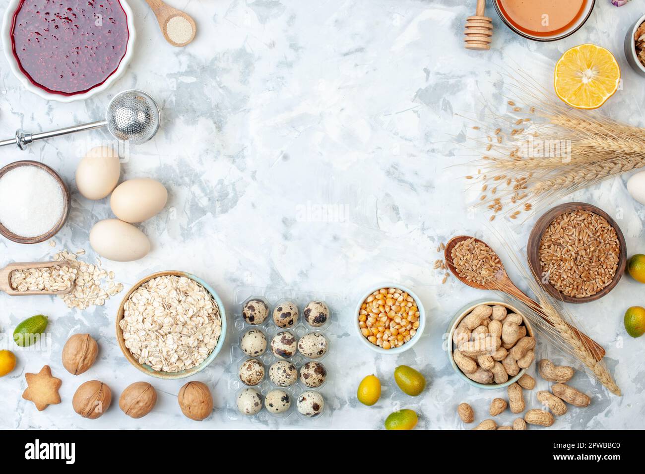 top view different pie ingredients nuts jelly flour seeds and eggs on ...