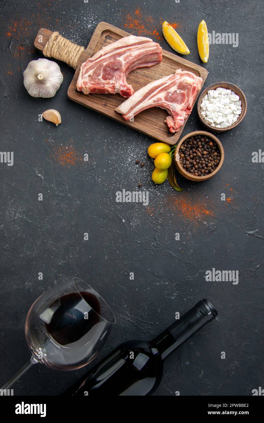 top view fresh meat ribs raw meat on dark background food barbecue ...