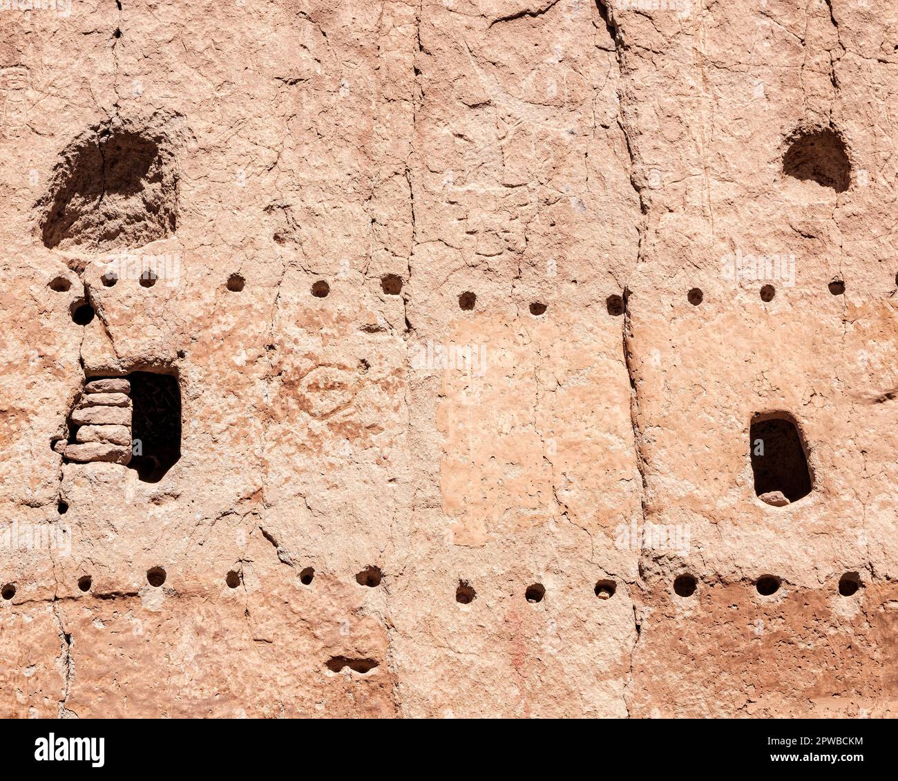 An abstract image is made from beam holes and caves from an ancient ...