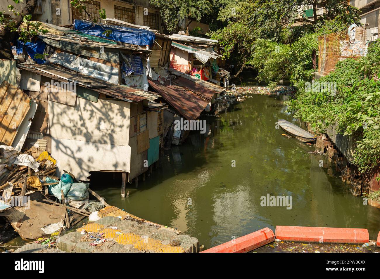 Low Quality Housing next to a canal in Binondo, Manila, The Philippines ...