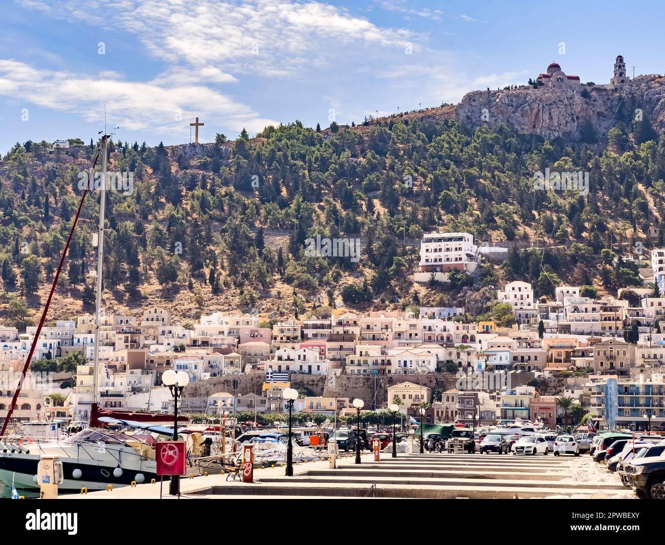 Beautiful view from Kalymnos marina to the mountaintop church. The ...