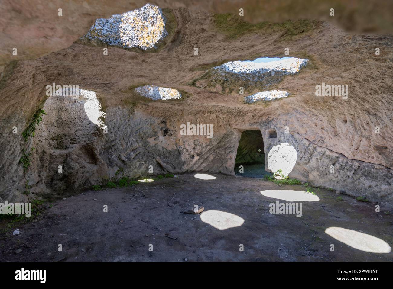 Ancient cave city. Inside the cave, view from the window Stock Photo ...