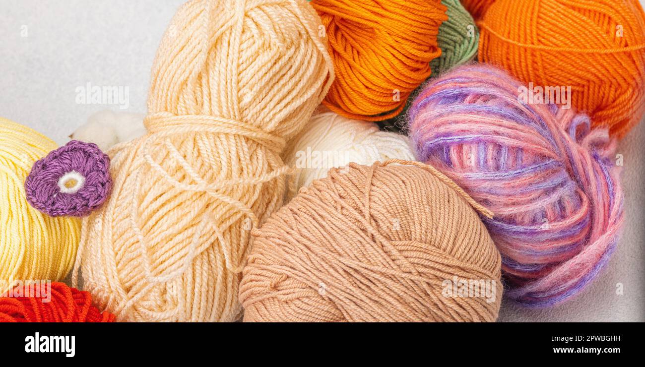 A set of colorful clew of thread for knitting and special craft tools ...
