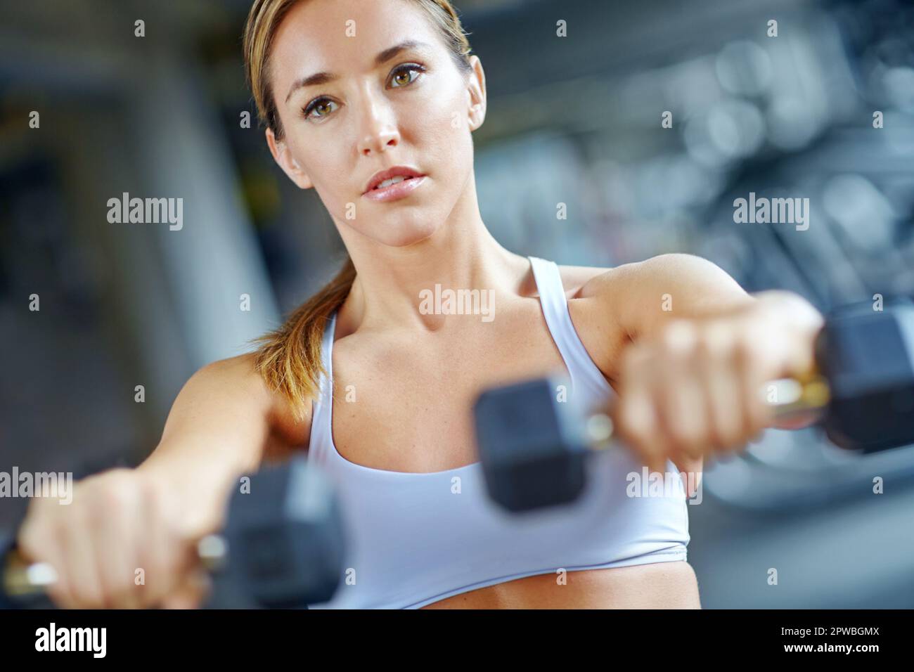 Im making great progress. A beautiful young woman working out at the ...