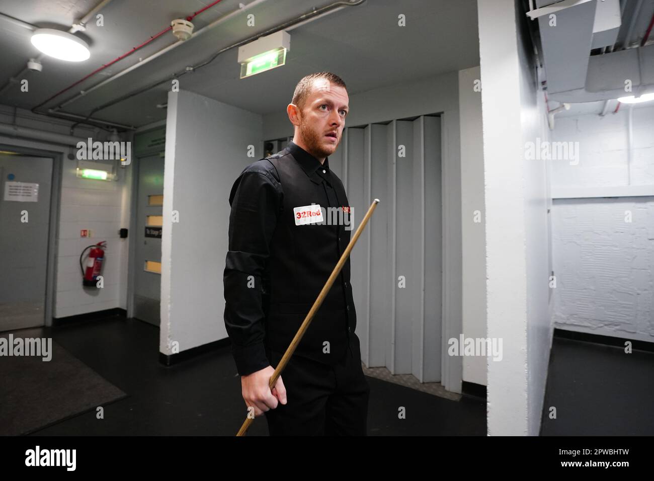 Mark Allen walks out to play Mark Selby (not pictured) on day fifteen ...
