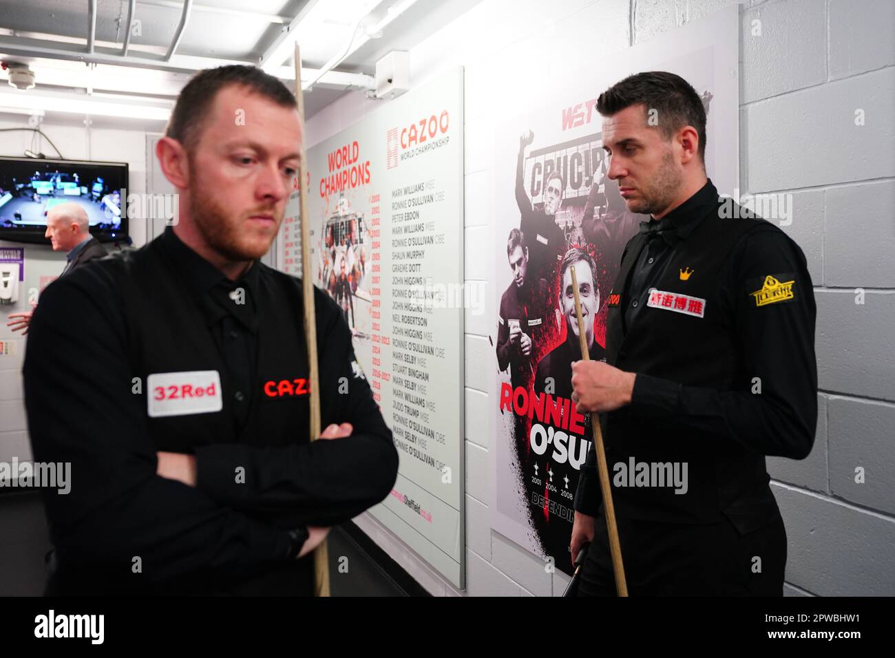 Mark Selby waits to play Mark Allen (left) on day fifteen of the Cazoo ...