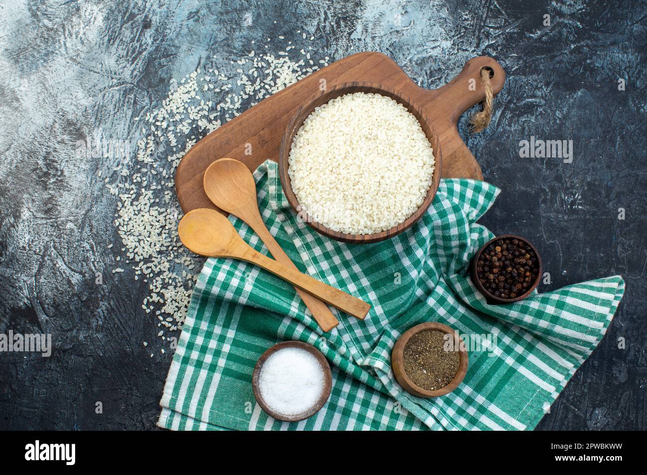 top view raw rice with seasonings on dark background cereal color soup ...