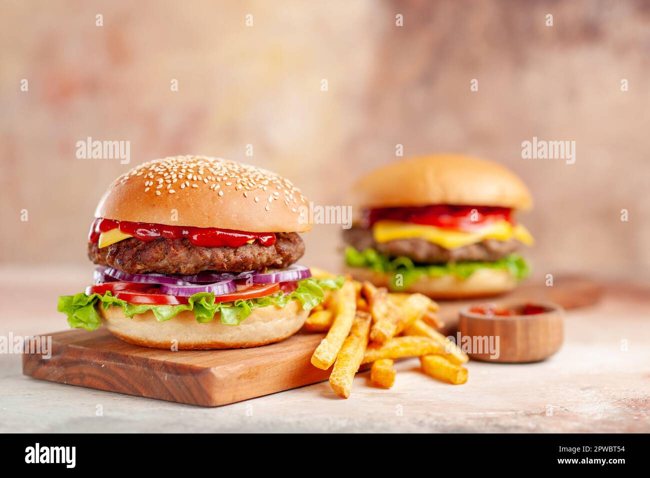 front view delicious cheeseburger on cutting board light background ...