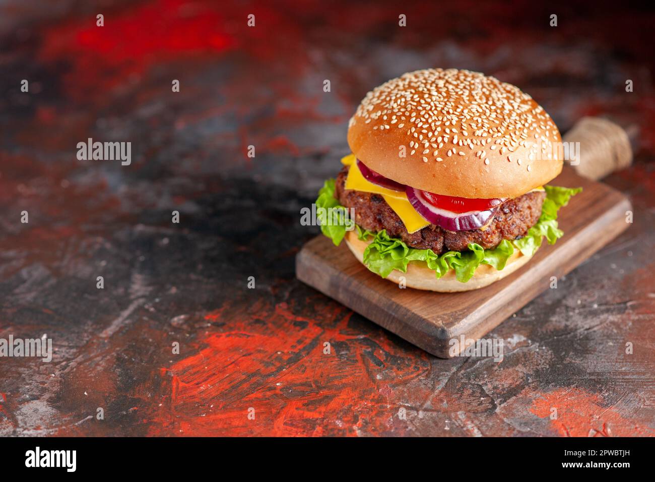front view delicious meat cheeseburger on dark brown background fast ...