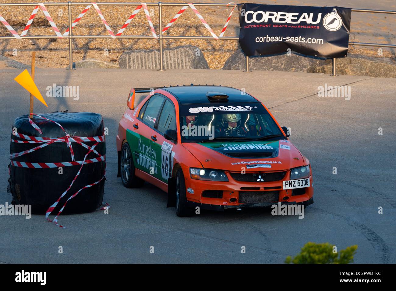 Andrew Pawley racing a Mitsubishi Lancer Evo 9 competing in the Corbeau ...