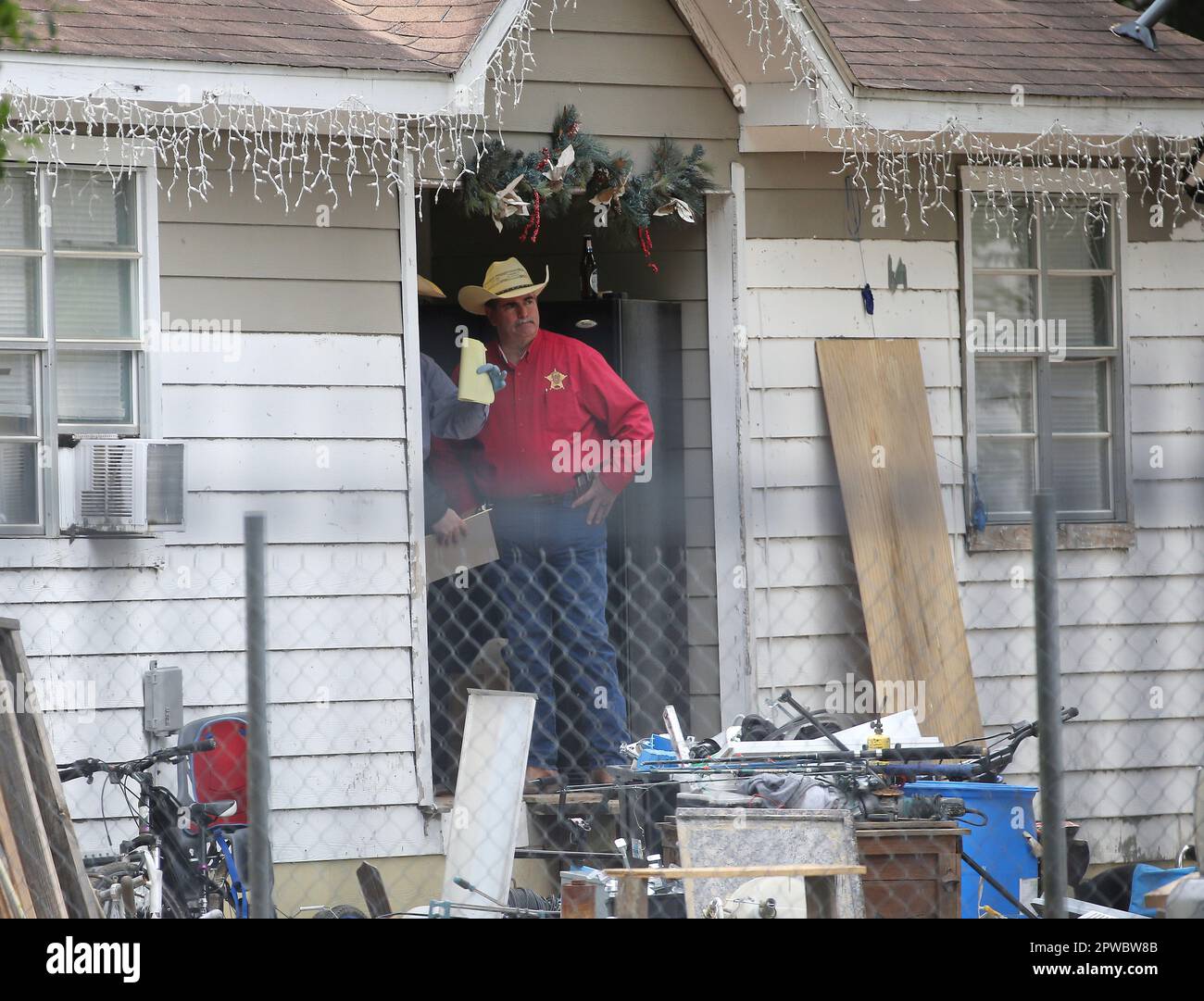 San Jacinto County Sheriff Greg Capers talks to investigators at the ...