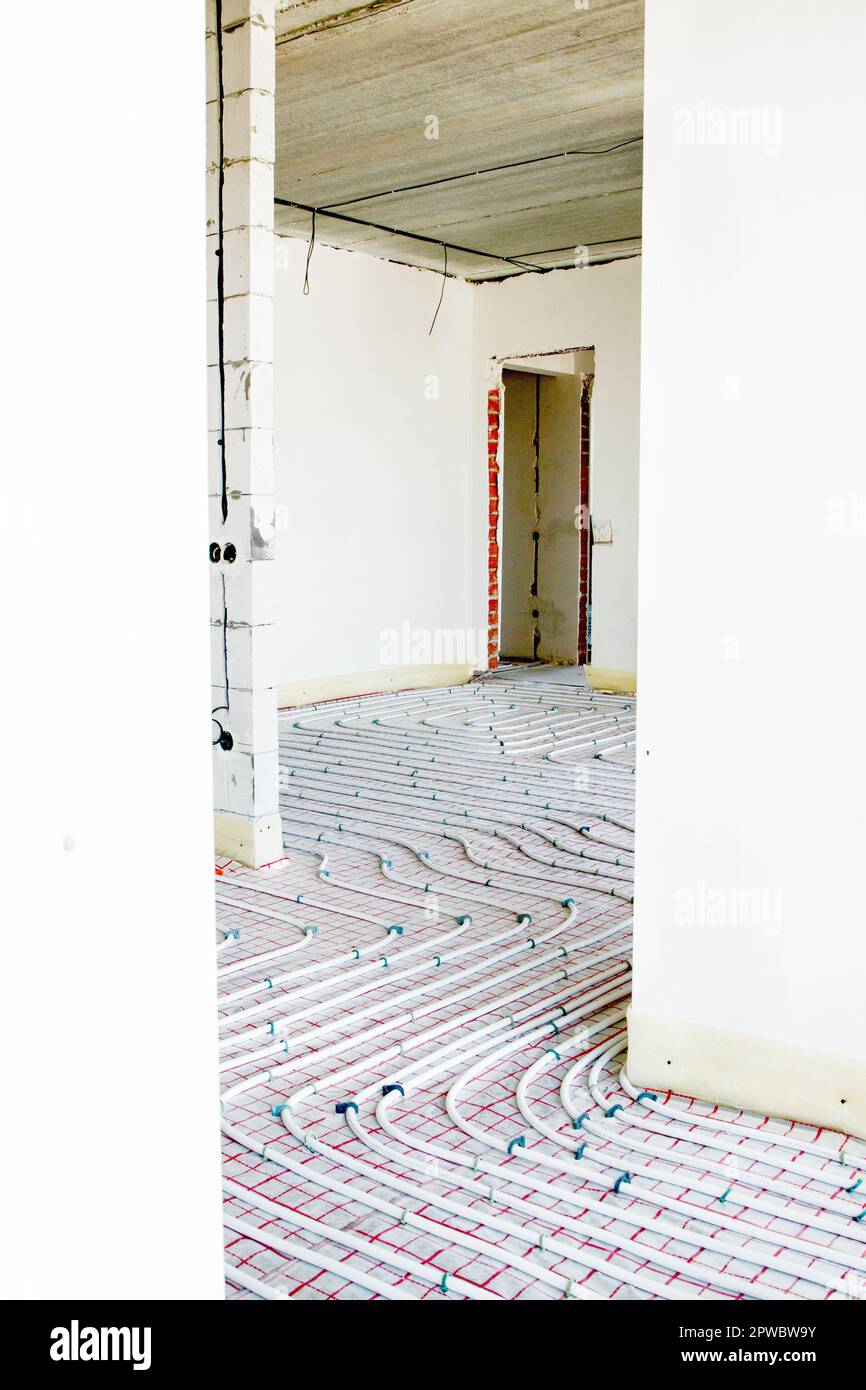 Installation of underfloor heating pipes for water heating. Heating ...