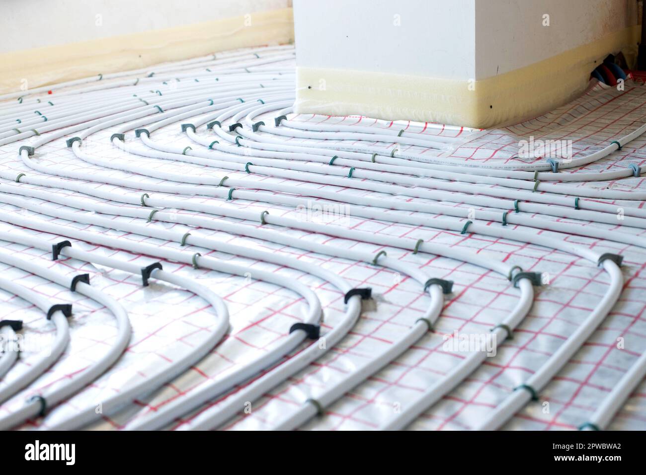 Installation of underfloor heating pipes for water heating. Heating systems. Pipes for ...