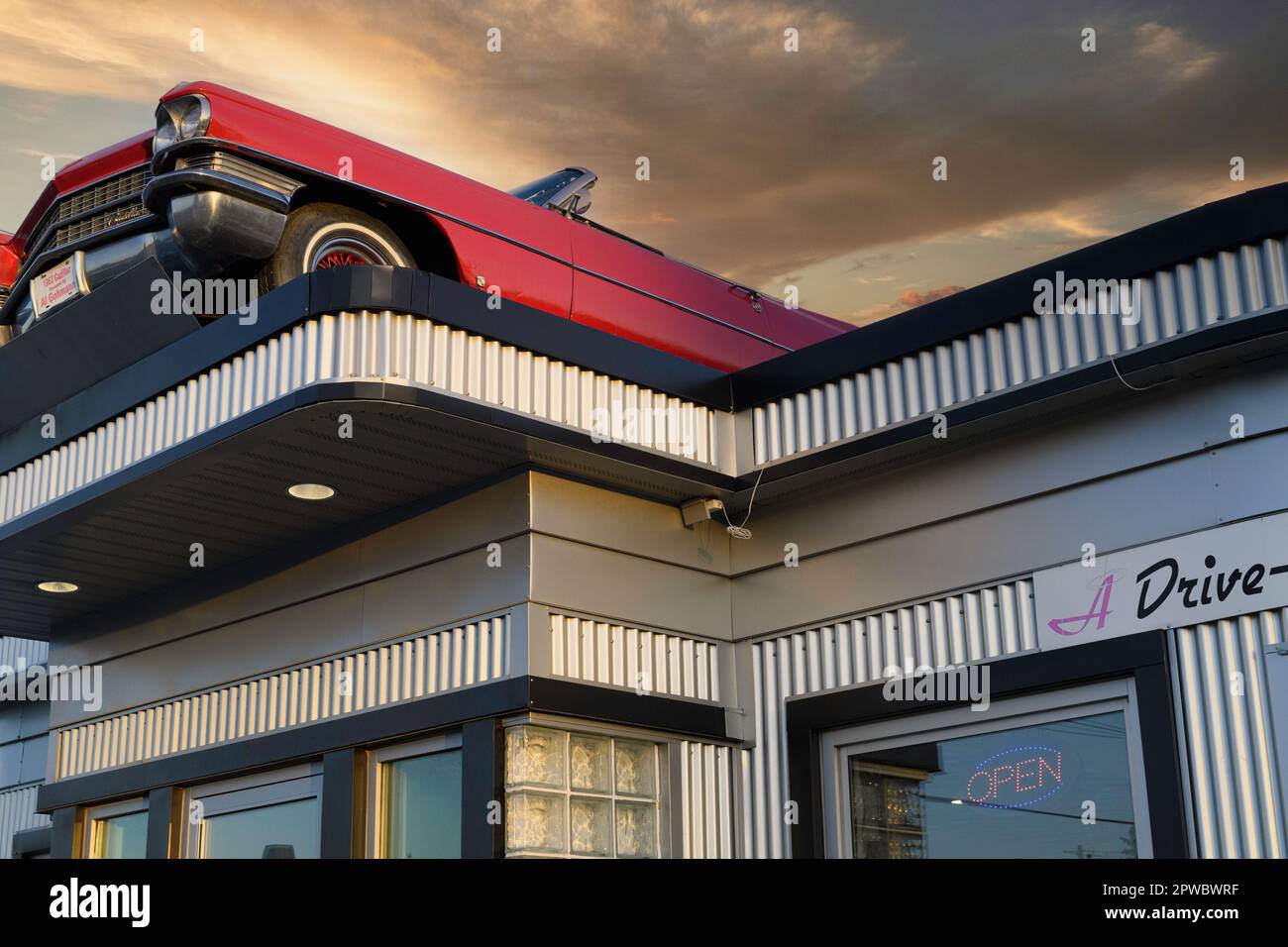 Vintage 60s or 50s-styled burger restaurant with a 1963 Cadillac ...