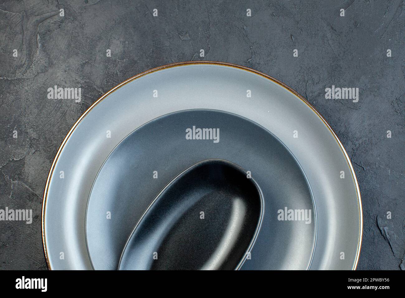 top view different elegant plates on dark background silverware grace ...