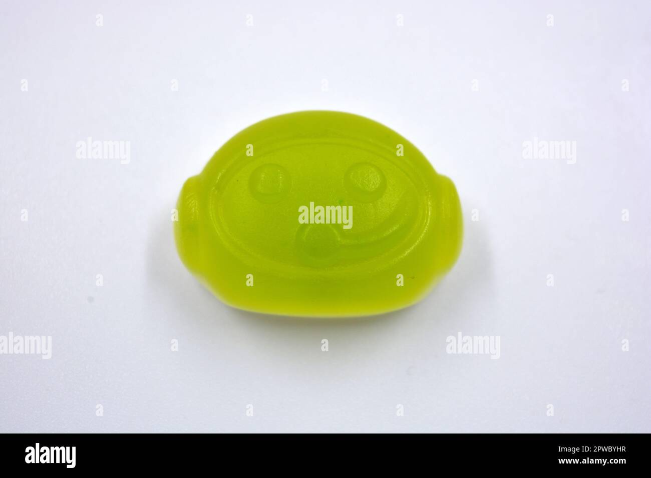 Beautiful and bright colored sweets in the form of various alien ...