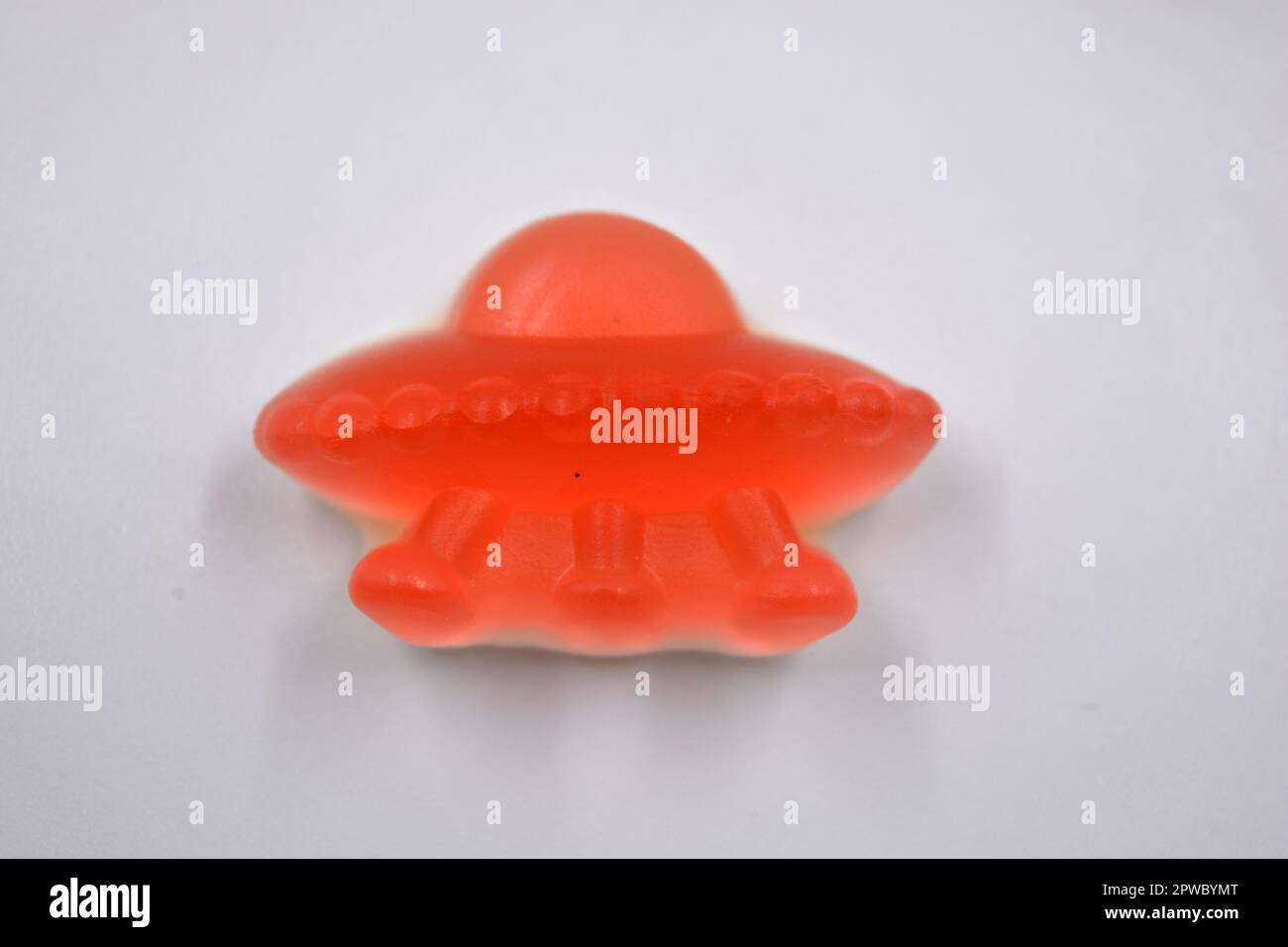 Beautiful and bright colored sweets in the form of various alien ...