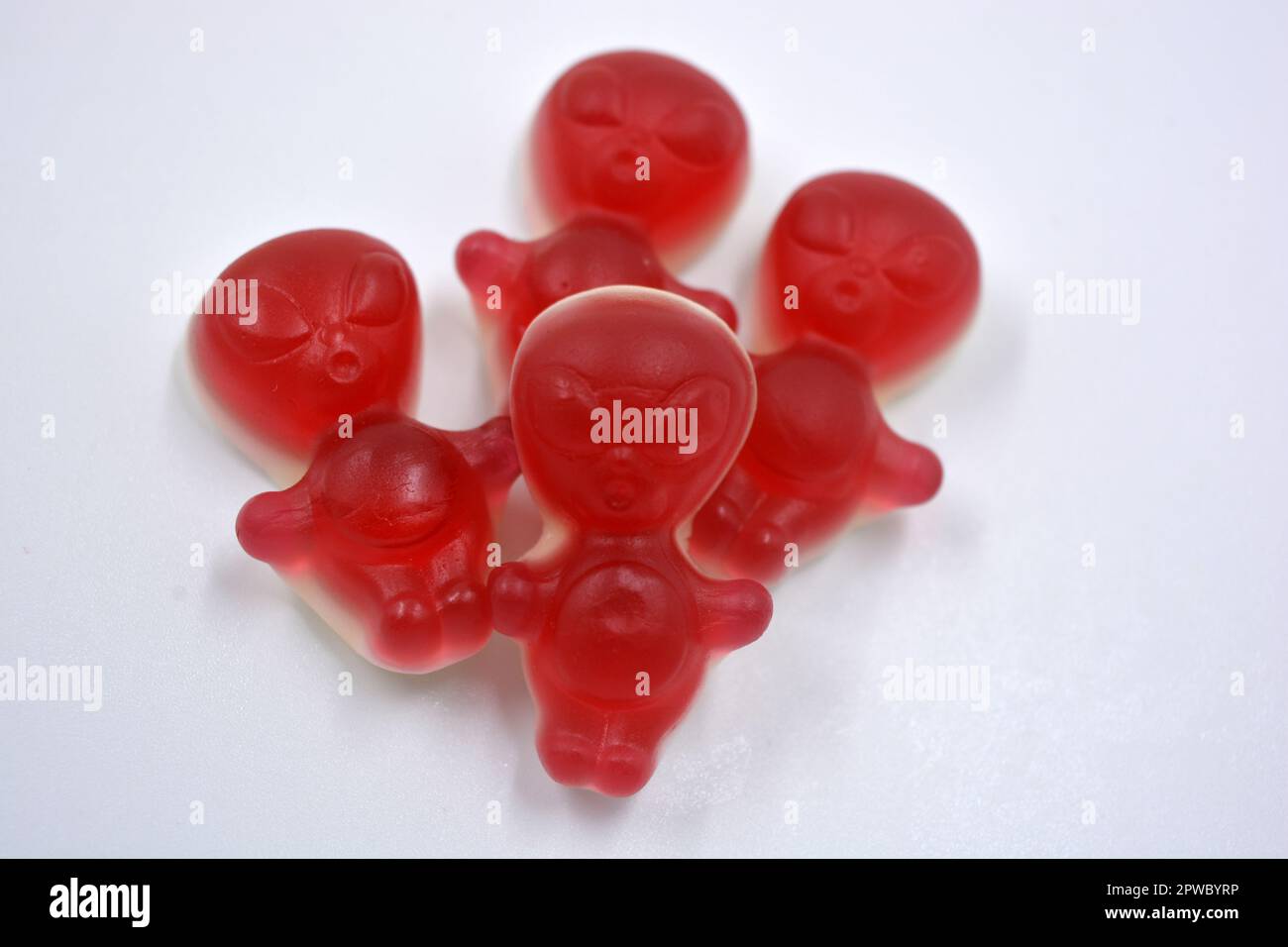 Beautiful and bright colored sweets in the form of various alien ...