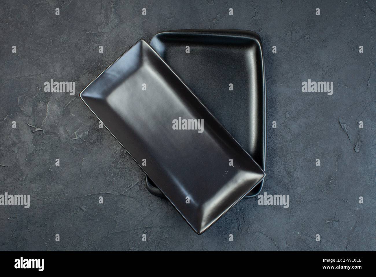 top view long black plates on dark background glass horizontal food ...