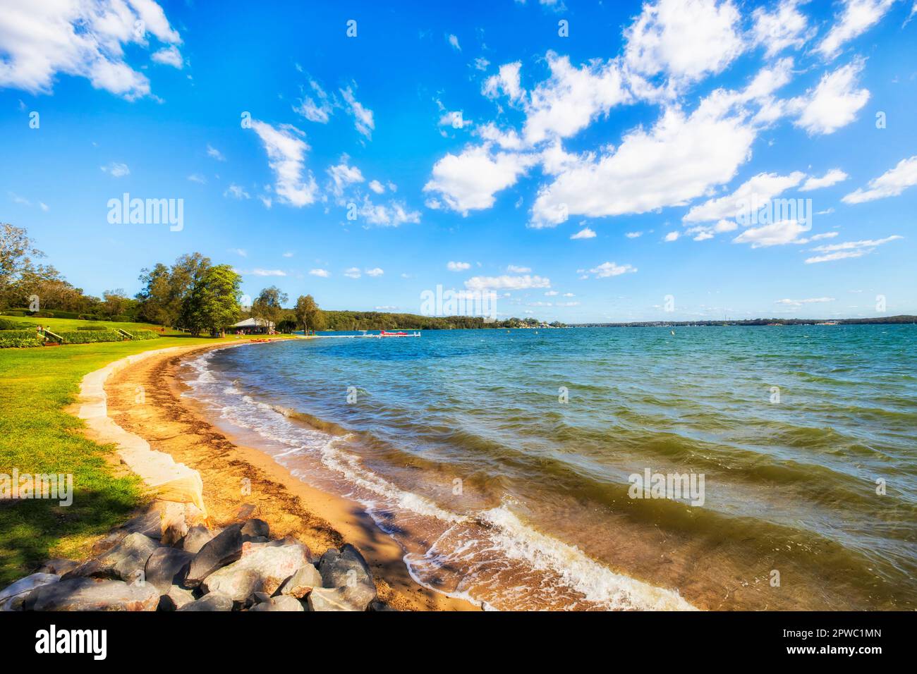 Wide sandy grass beach on Lake Macquarie at Murrays beach Cams wharf ...