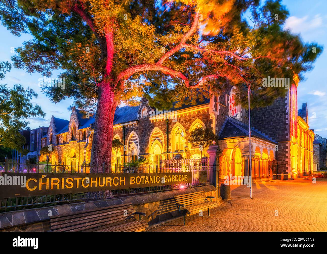 Public Christchurch botanic gardens entrance gate at sunset with bright ...