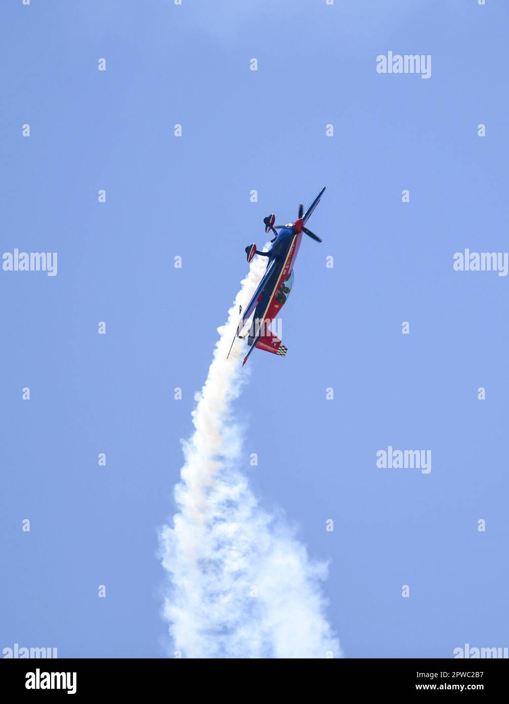 An EXTRA 300S flies over Keesler during a practice session for the 2023 ...
