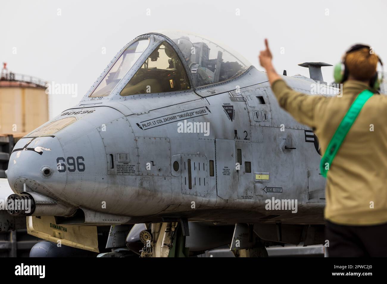 U.S. Air Force Airman 1st Class James Rodriguez, right, a crew chief ...
