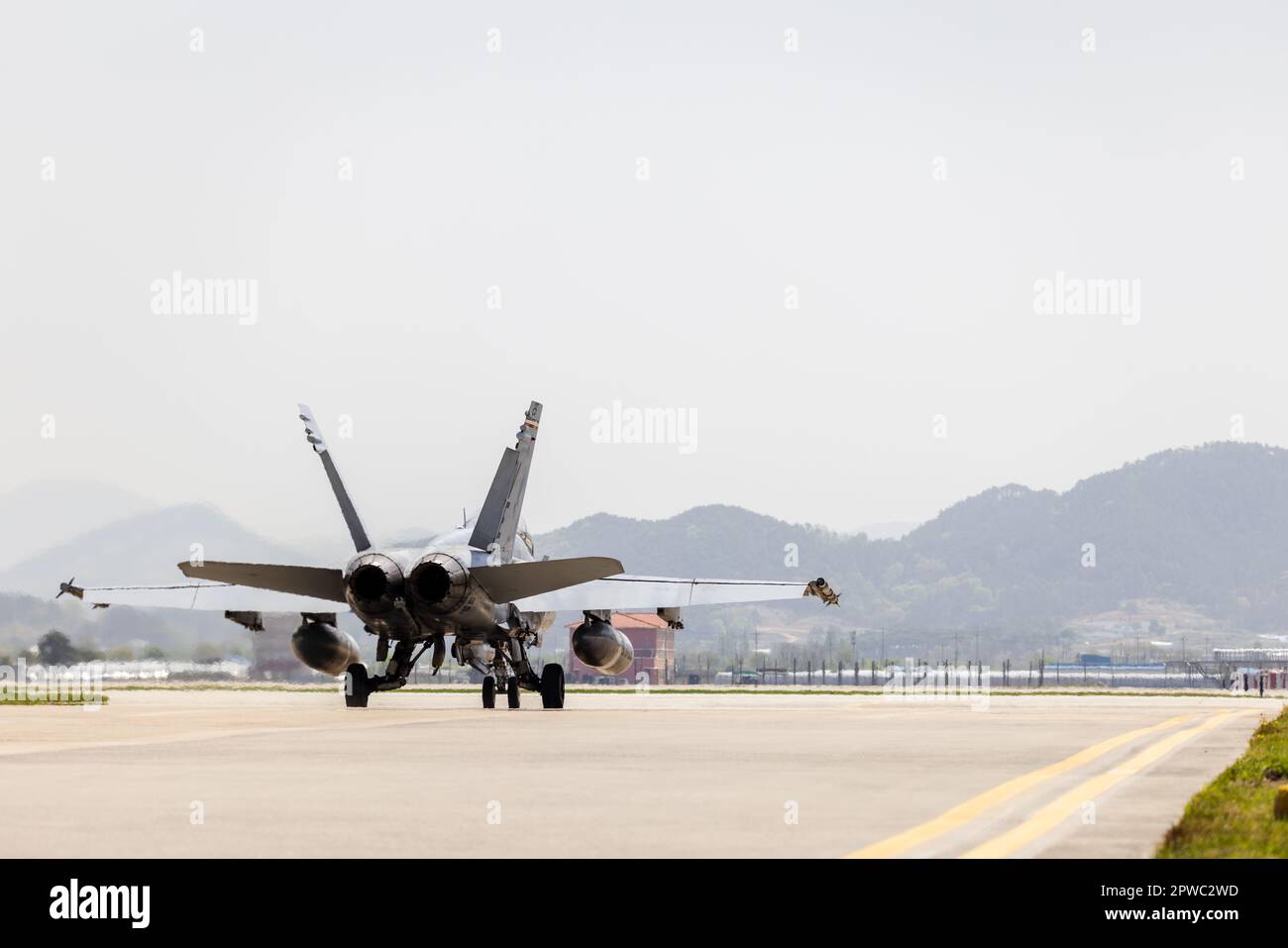 A U.S. Marine Corps F/A-18 Hornet aircraft with Marine Fighter Attack ...