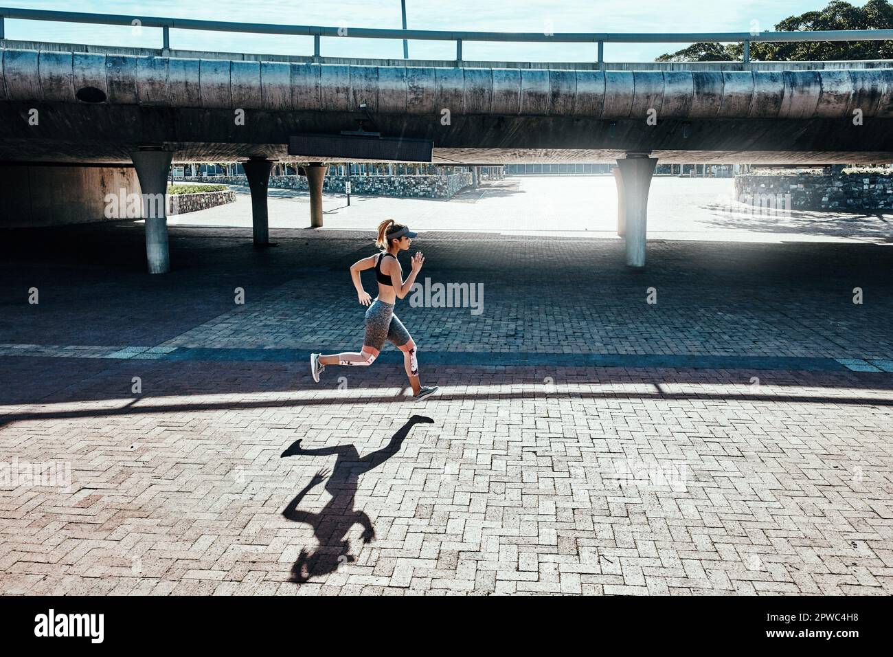 Taking her run one step at a time. Full length shot of an attractive ...