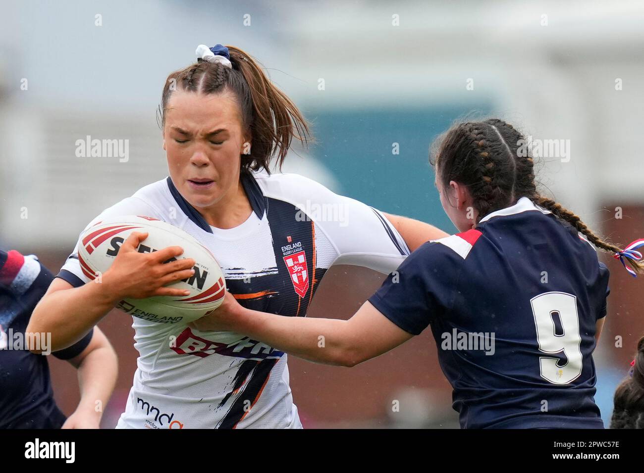 Hollie-Mae Dodd #12 of England hands off Fanny Ramos #9 of France ...