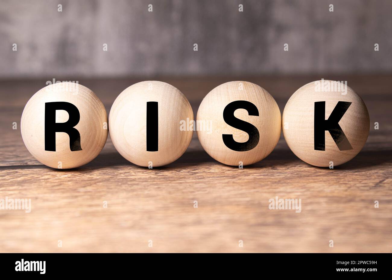 Rise vs Risk symbol. Turned wooden cubes with words Risk vs Rise ...