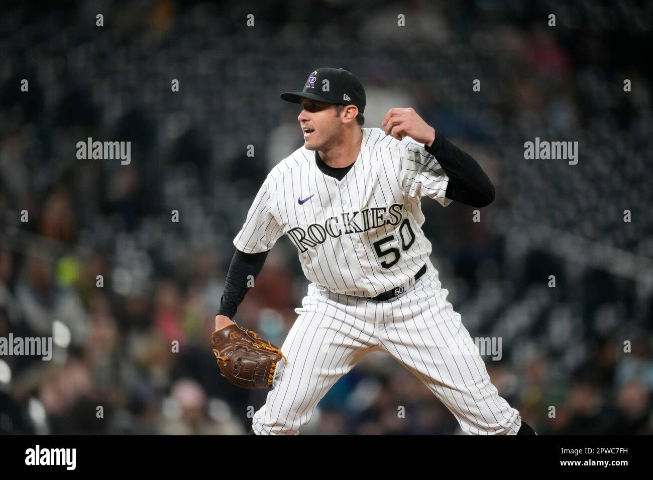 Colorado Rockies relief pitcher Ty Blach (50) in the ninth inning of a ...
