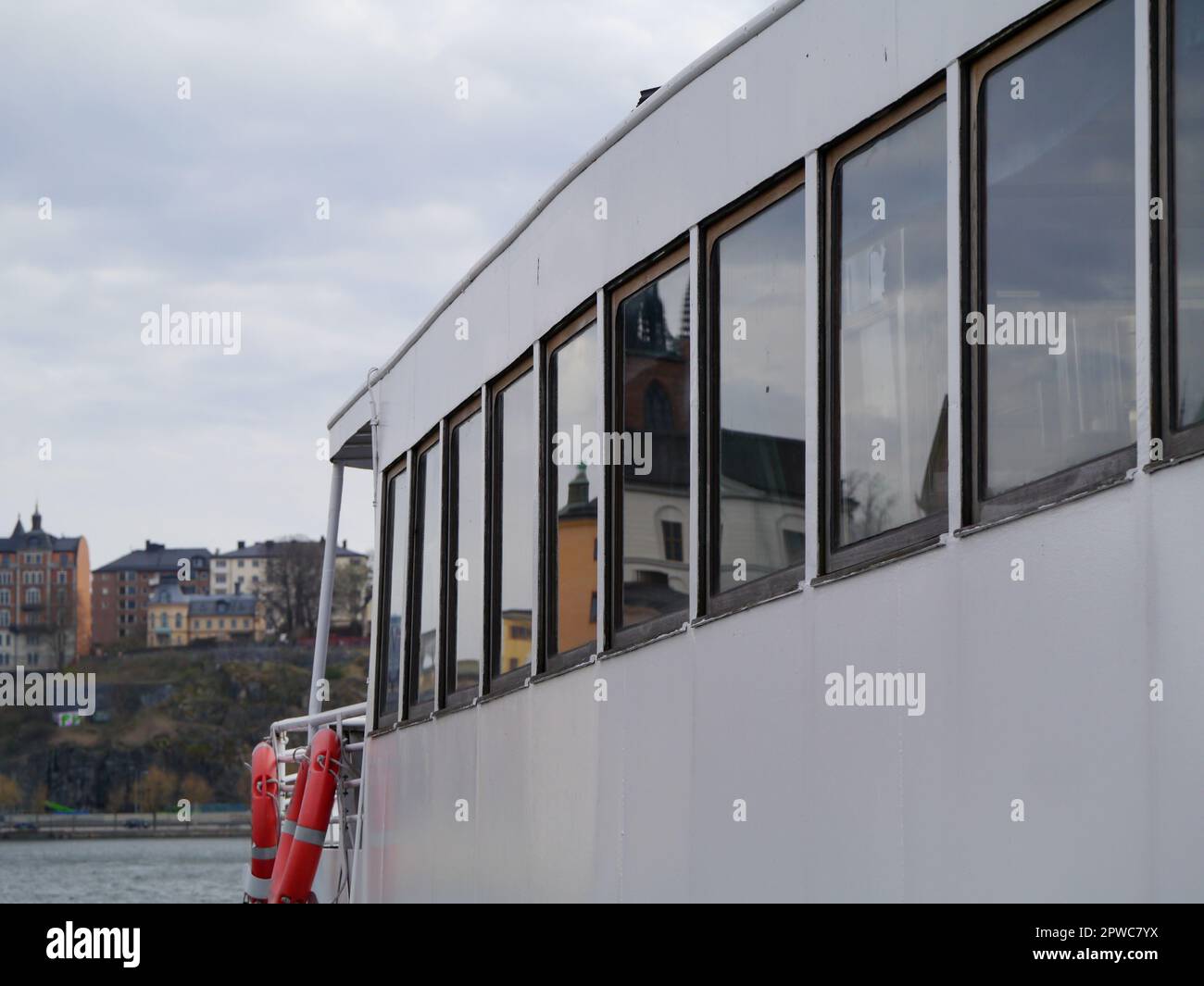 Side view of a boat in the city Stock Photo - Alamy