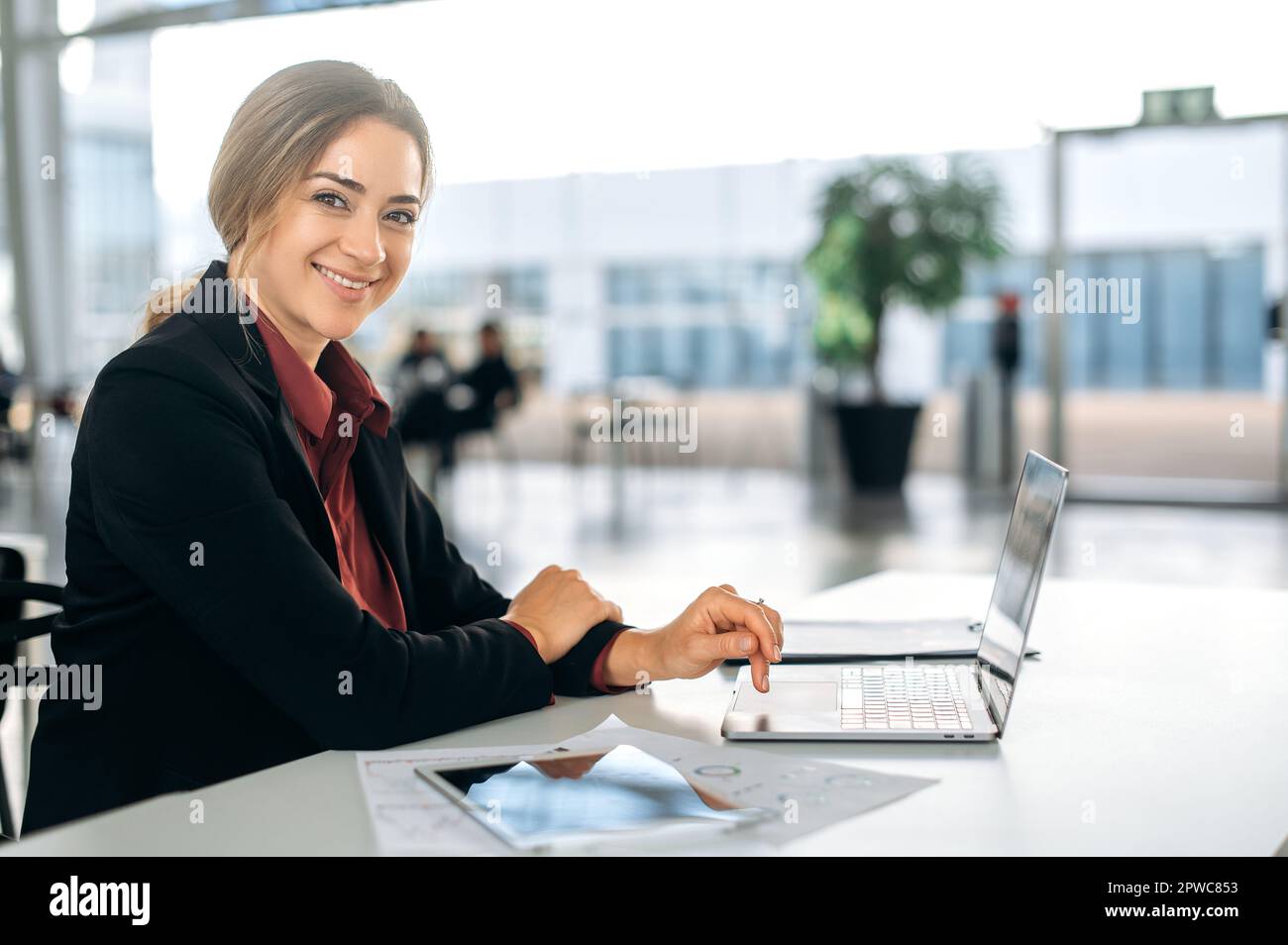 Positive gorgeous successful caucasian woman, business lady, employee ...